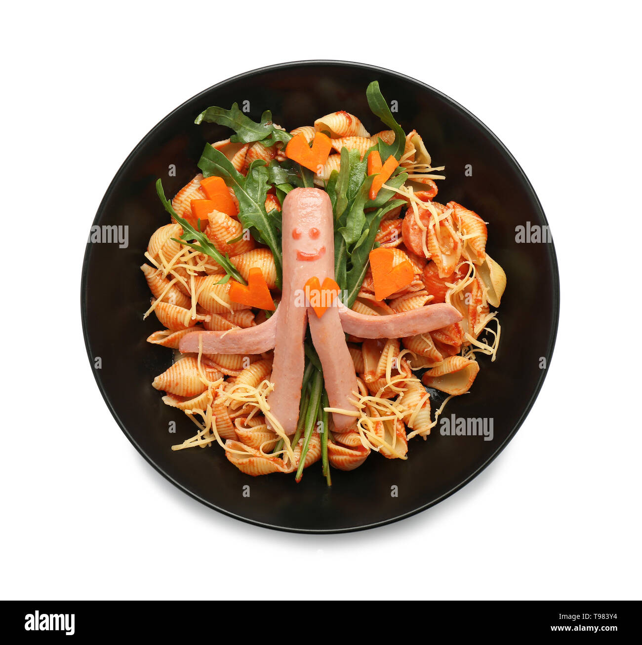 Plate with pasta and sausage for child on white background Stock Photo ...