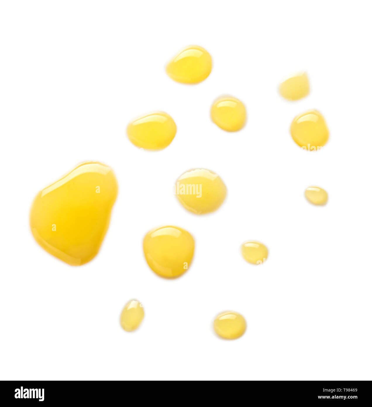 Spots of oil on white background Stock Photo - Alamy