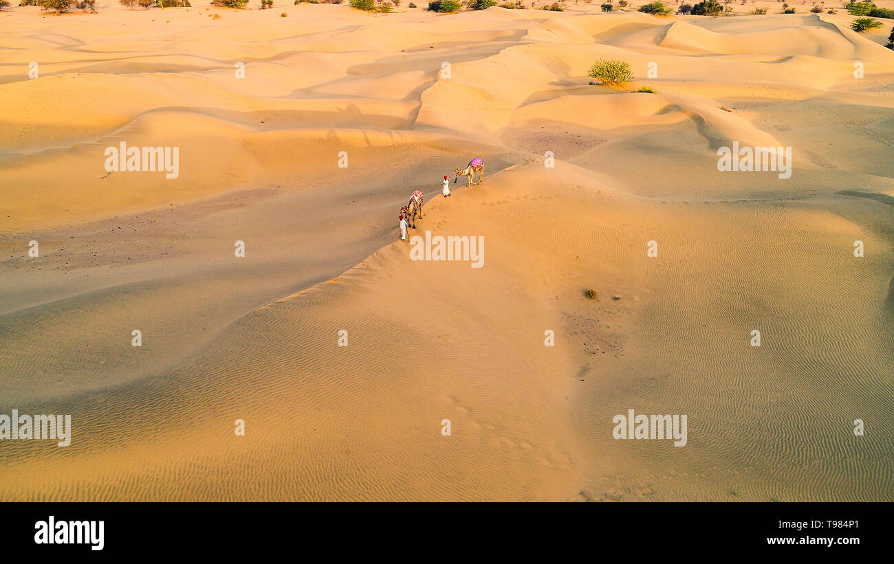 Aerial view of Jaisalmer Sam Sand Dunes, Man Walking with Camel ...