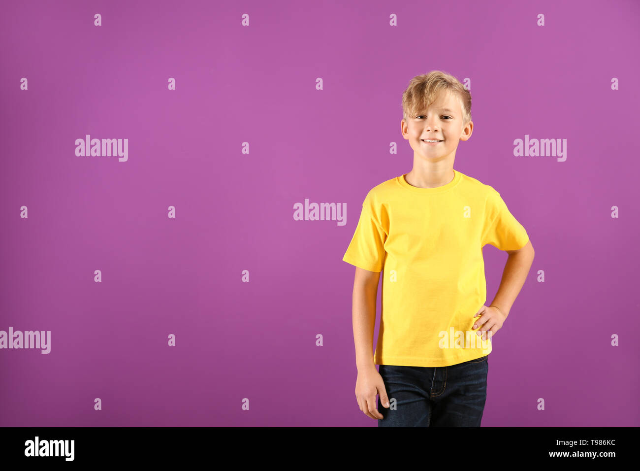 Boy in purple t shirt hi-res stock photography and images - Alamy