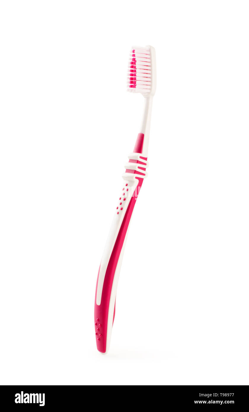 Pink toothbrush isolated on a white background Stock Photo - Alamy