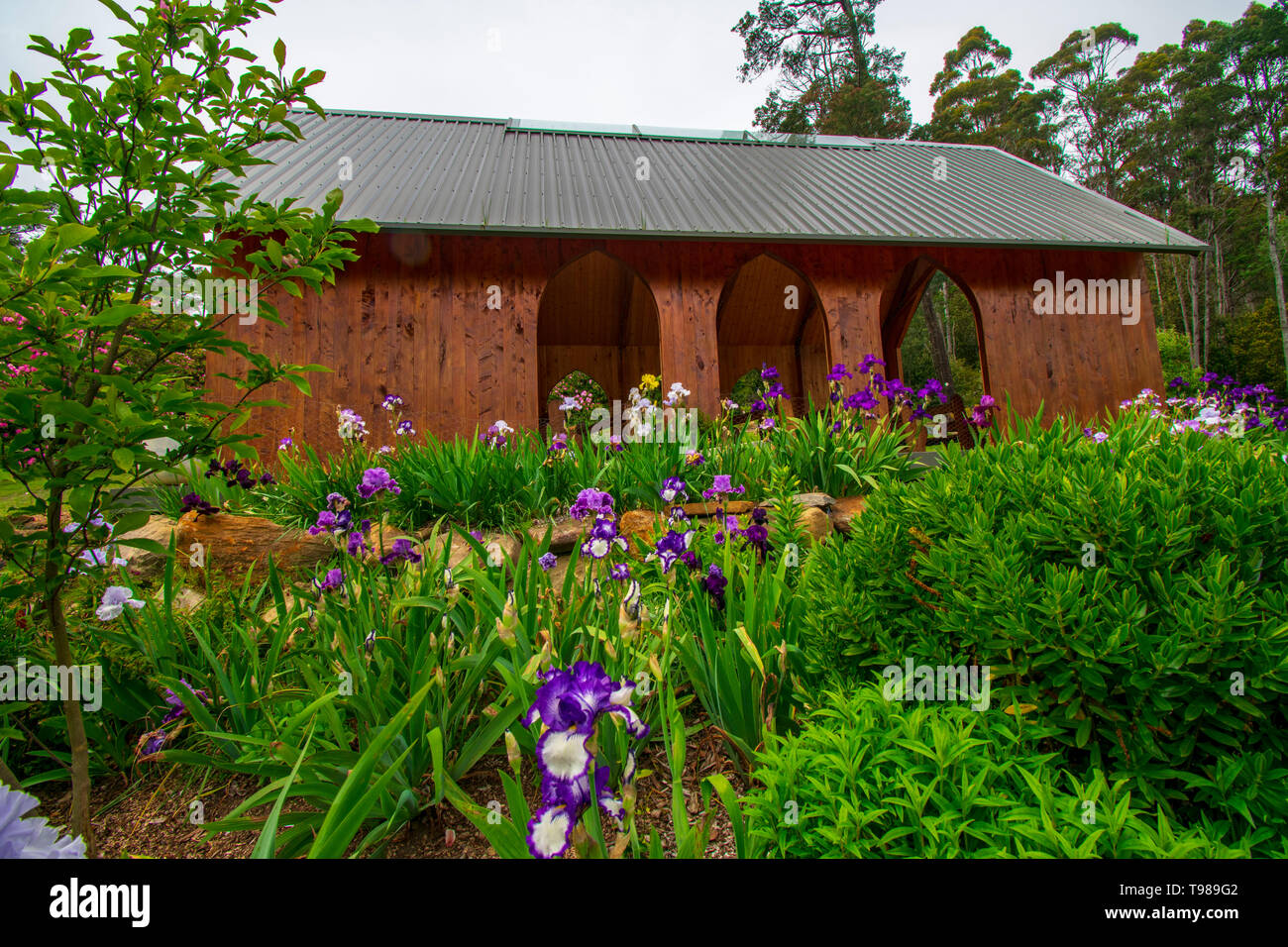 Lovely chapel in the garden Stock Photo - Alamy