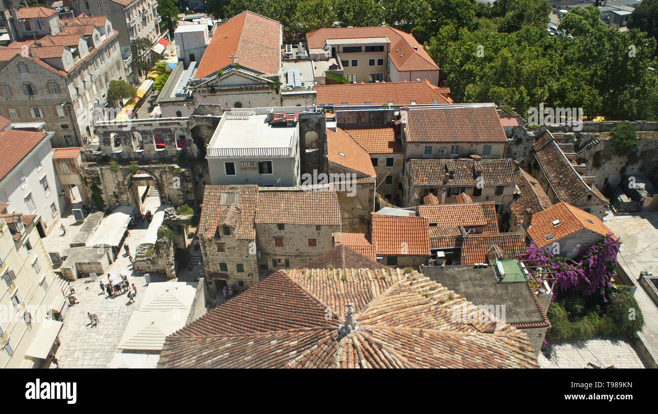 Top view of the city from the bell tower, roofs of houses in old town ...