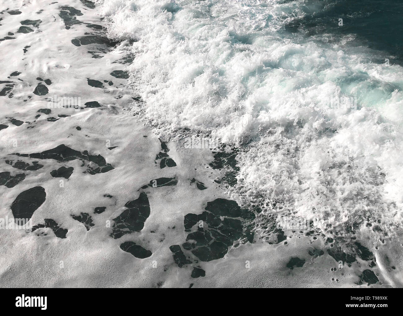 Foamy surf. Morning waves on the Mediterranean Stock Photo - Alamy