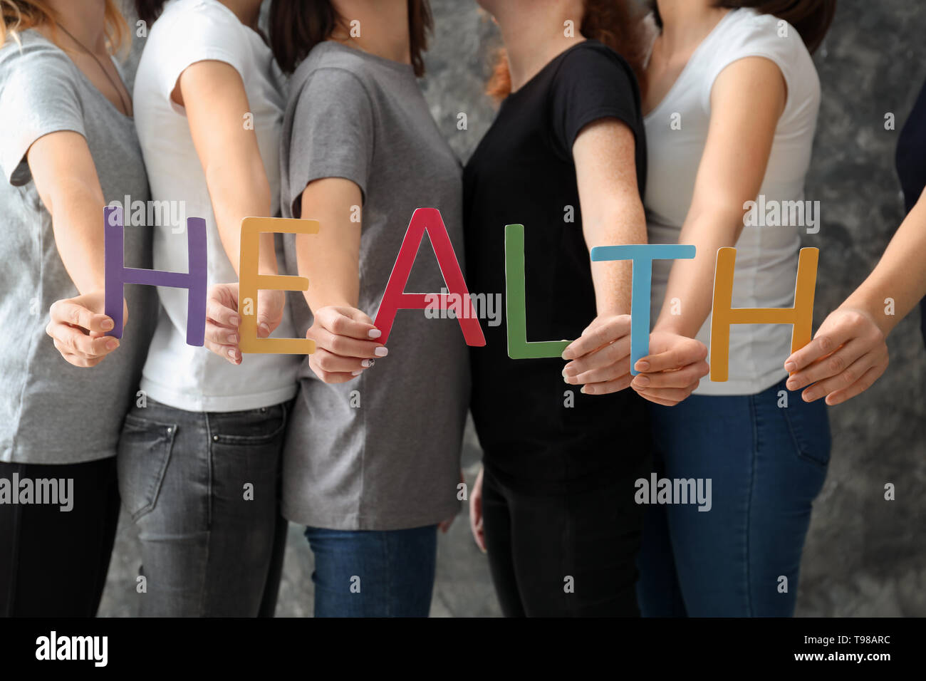 Body forming letters hi-res stock photography and images - Alamy