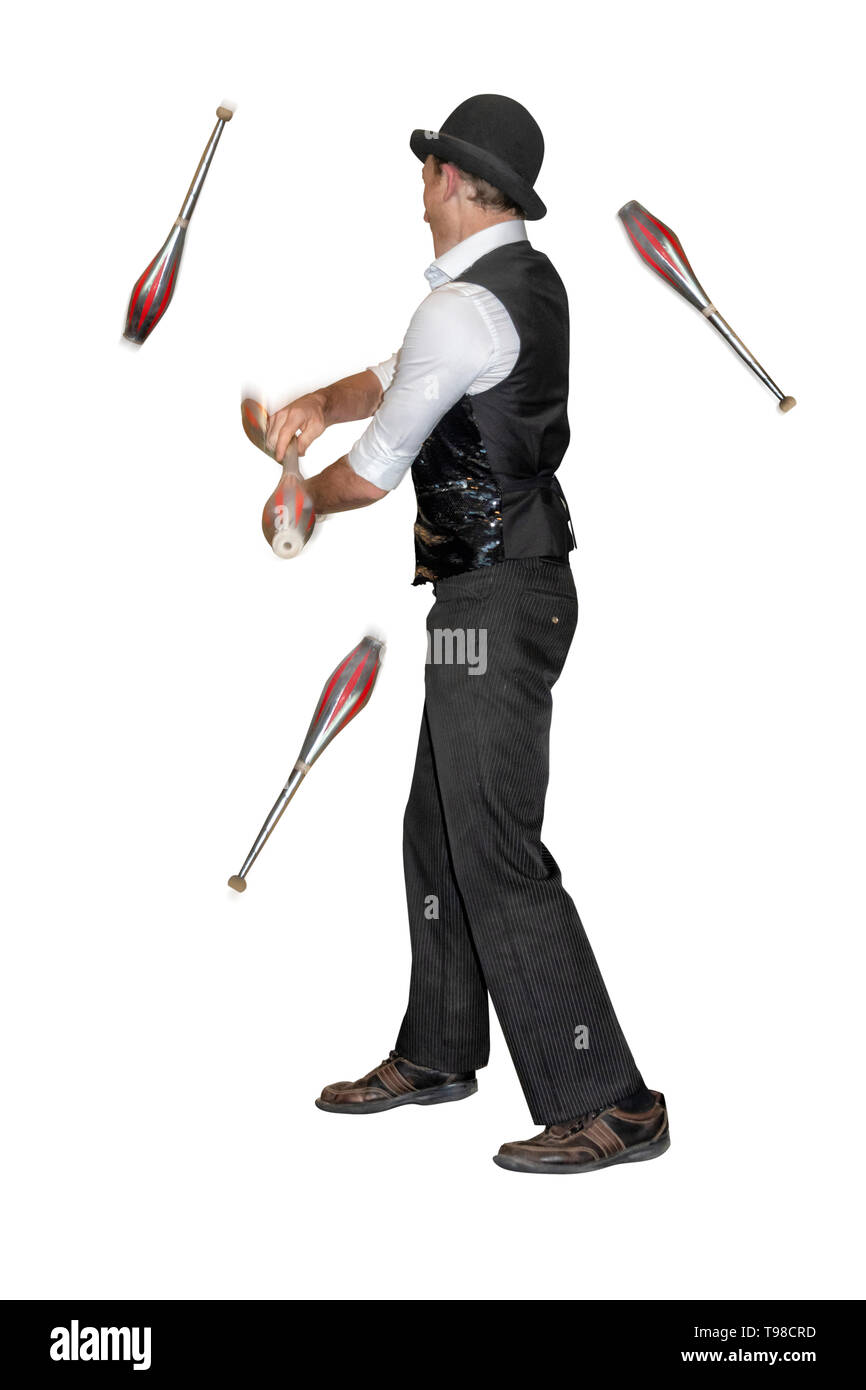 Juggler juggling many pins on white background Stock Photo - Alamy