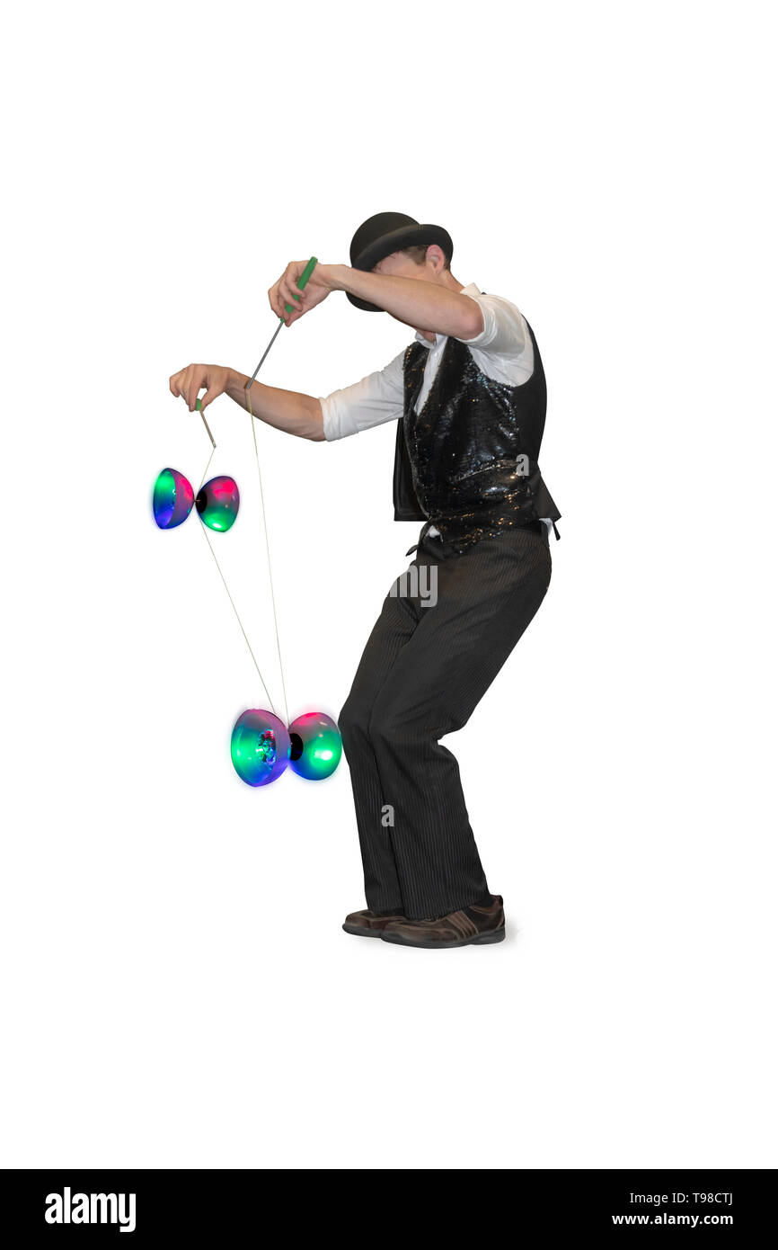 Juggler playing with diabolo on white background Stock Photo - Alamy