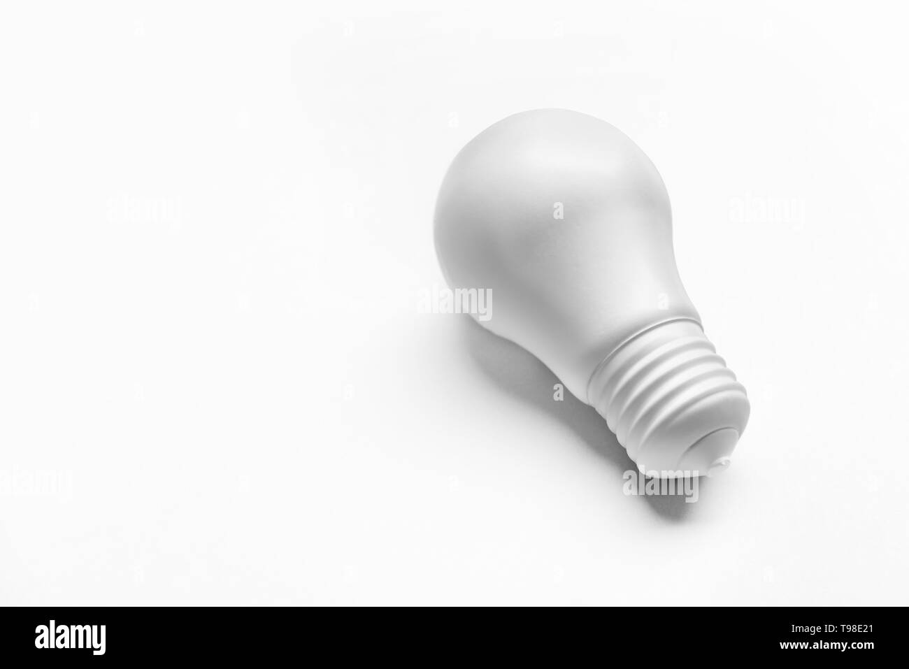 Painted light bulb on white background Stock Photo - Alamy