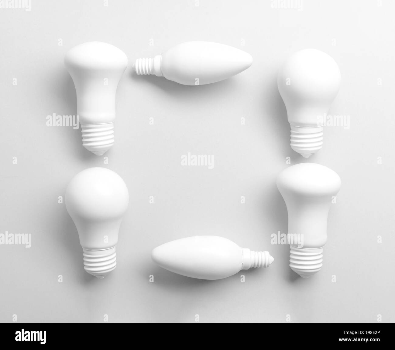 Frame made of light bulbs on white background Stock Photo - Alamy