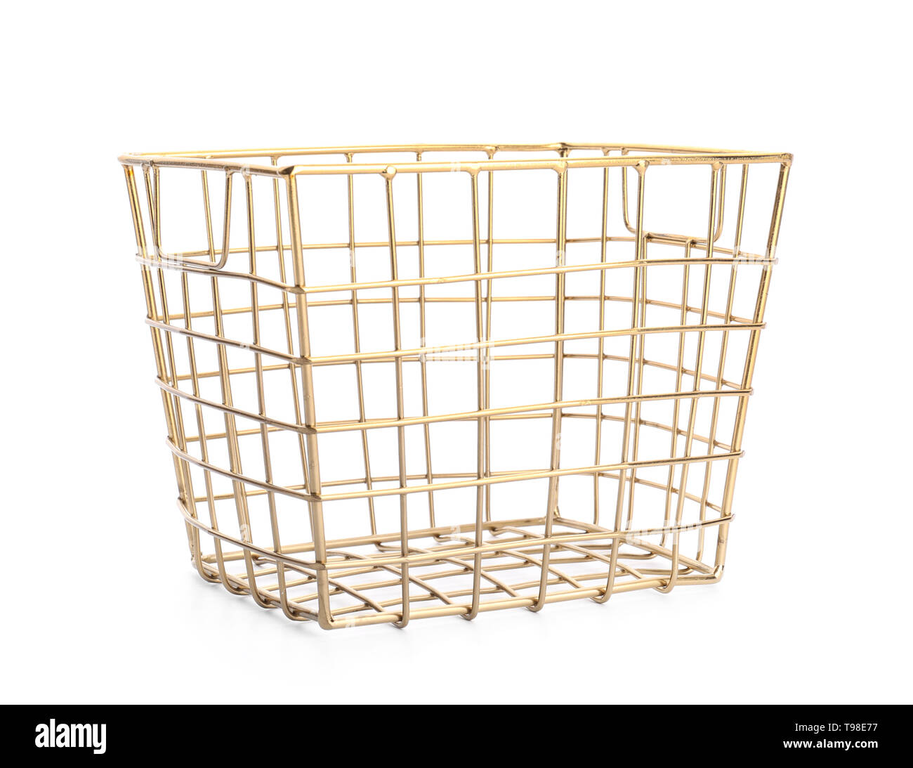 Golden basket on white background Stock Photo - Alamy