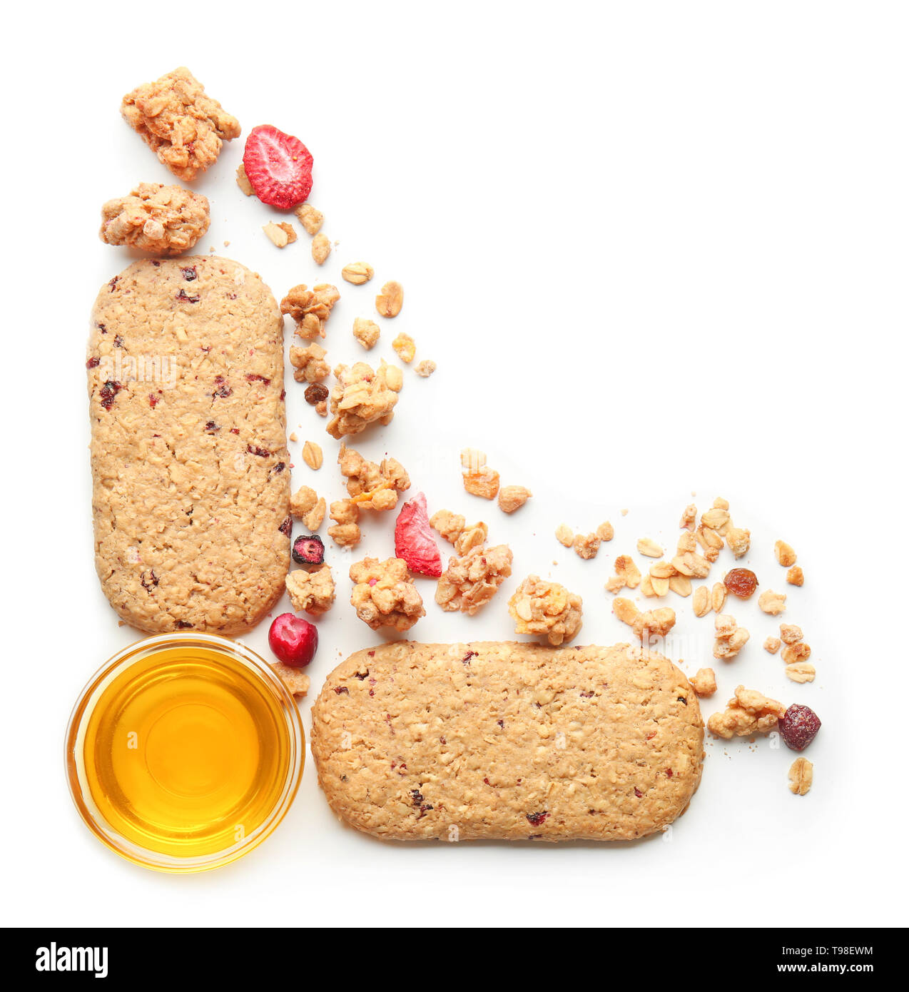 Composition with granola, cookies and sweet honey on white background ...