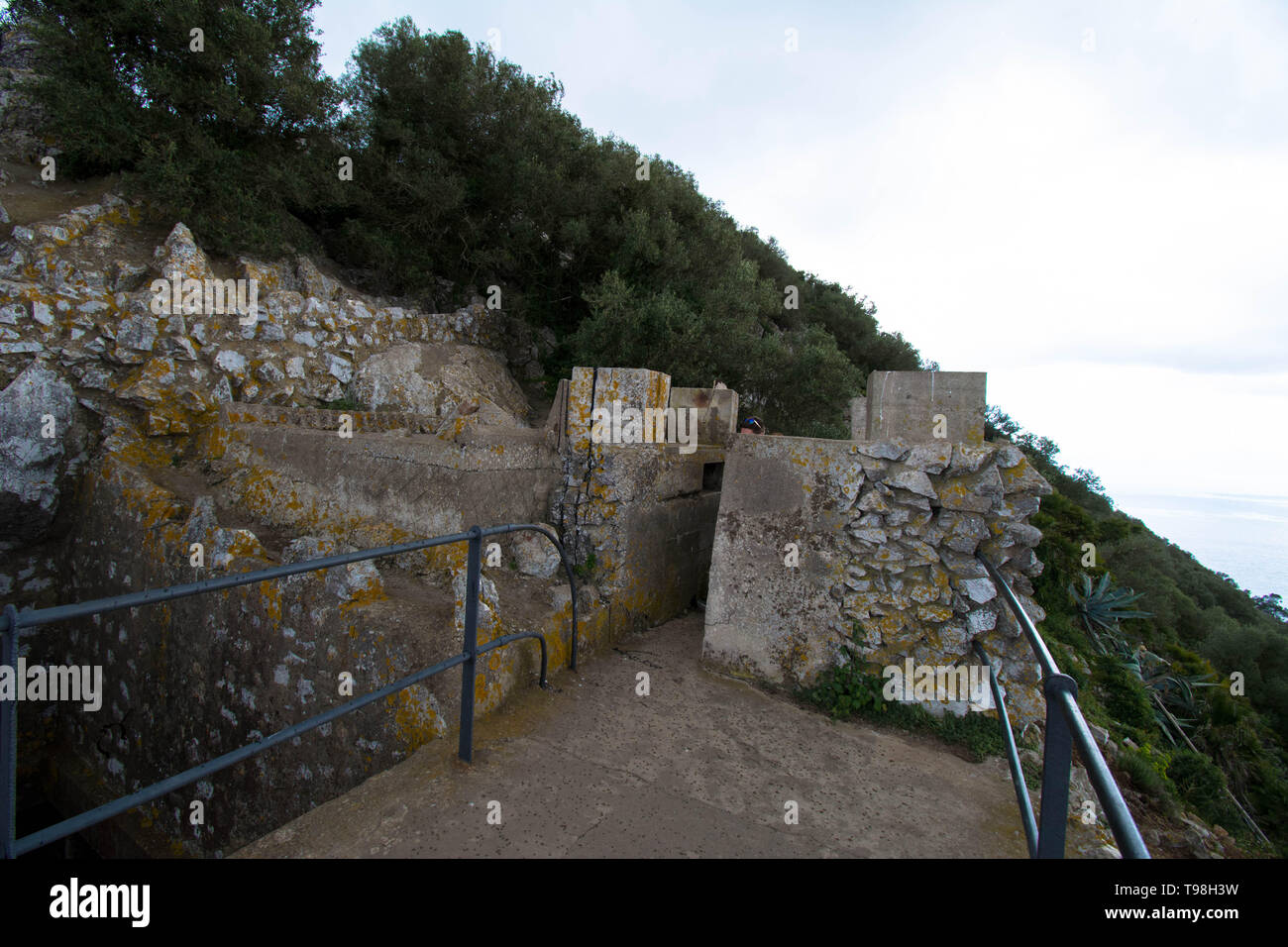 Railed path Gibraltar rock stones wall view outside wall gap stone ...