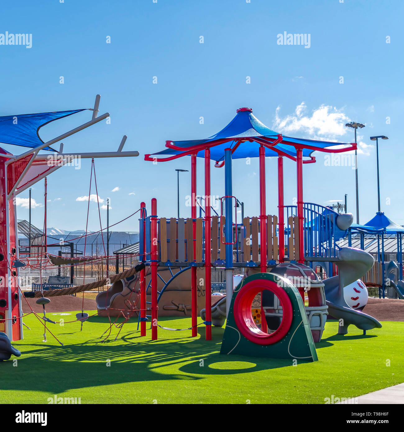 Clear Square Colorful playground for children casting shadows on the ...