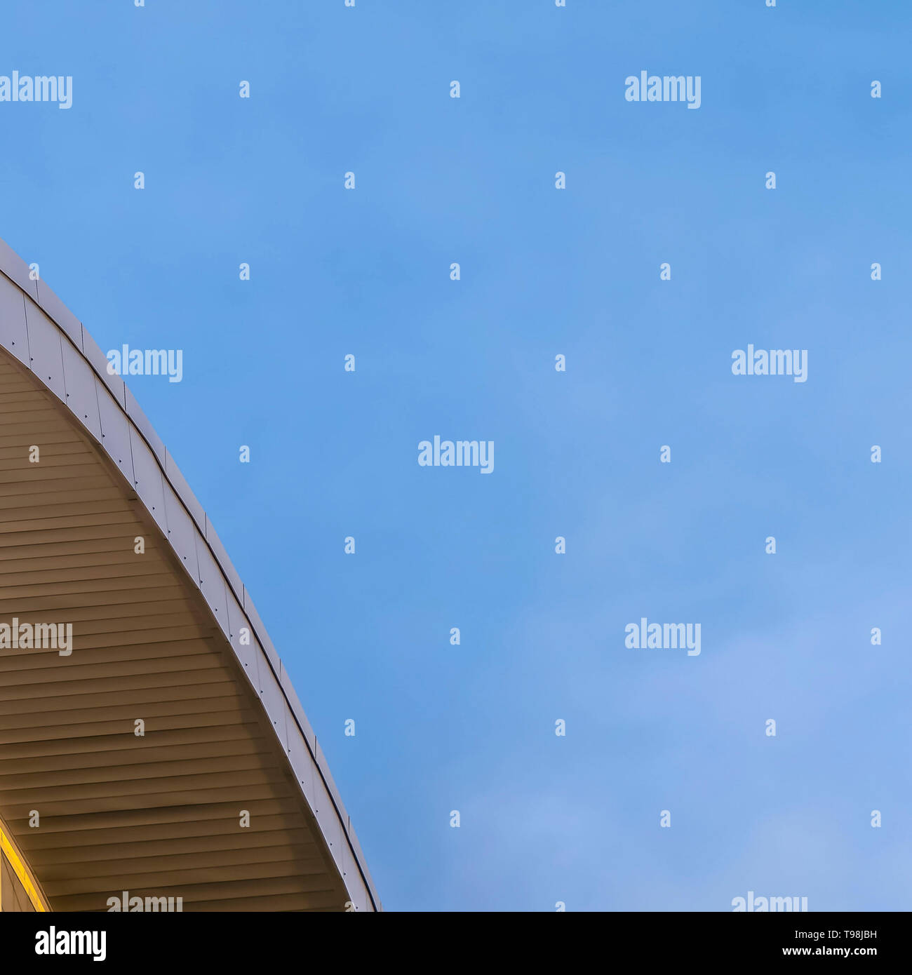 Clear Square Close up view of the exterior of a building with a curve ...