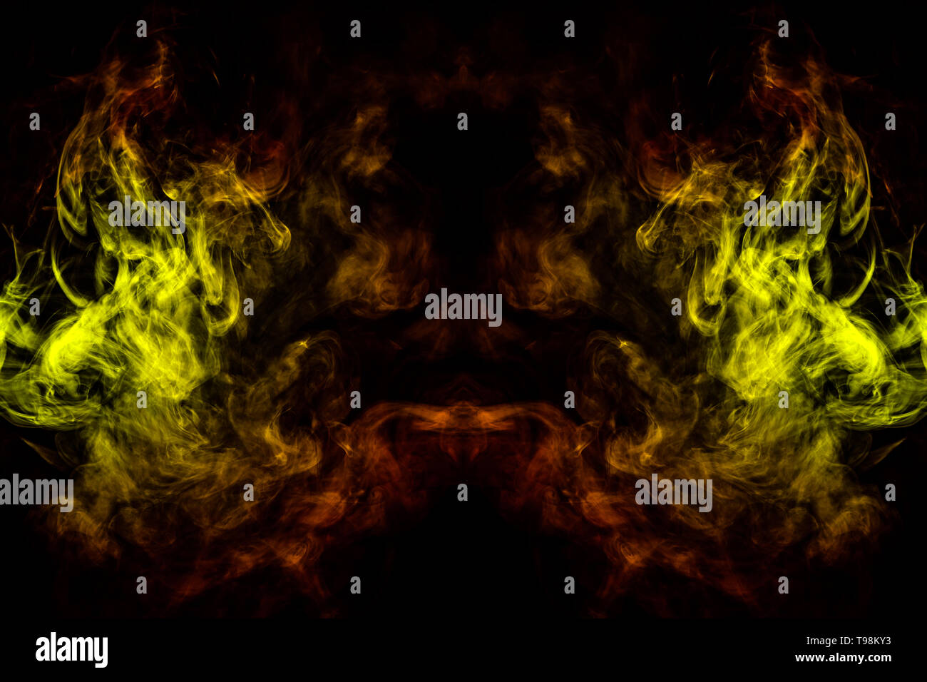 Smoke of different green, yellow, orange and red colors in the form of ...
