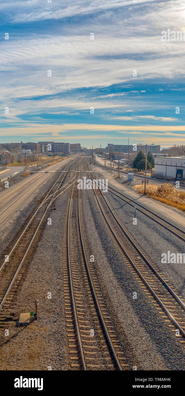 Clear Vertical Railroad tracks and roads with mountain and vibrant ...