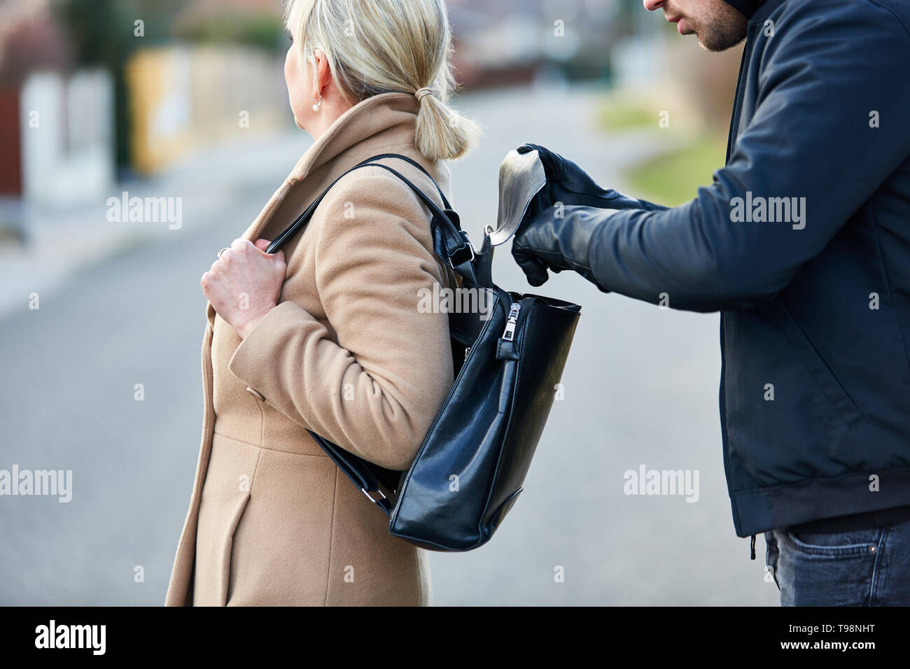 Woman stealing hi-res stock photography and images - Alamy