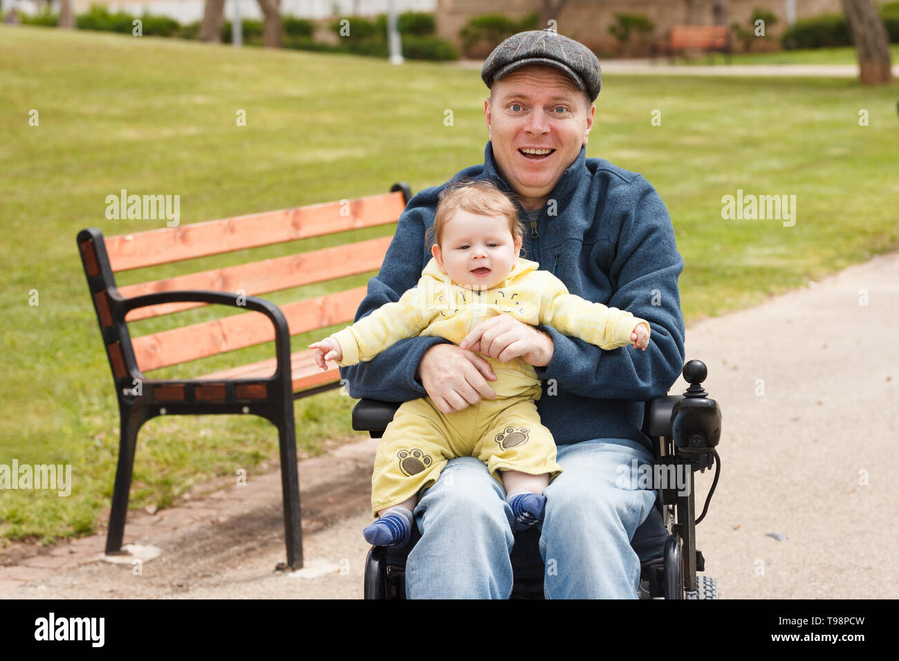 Disabled father play with his little son Stock Photo - Alamy