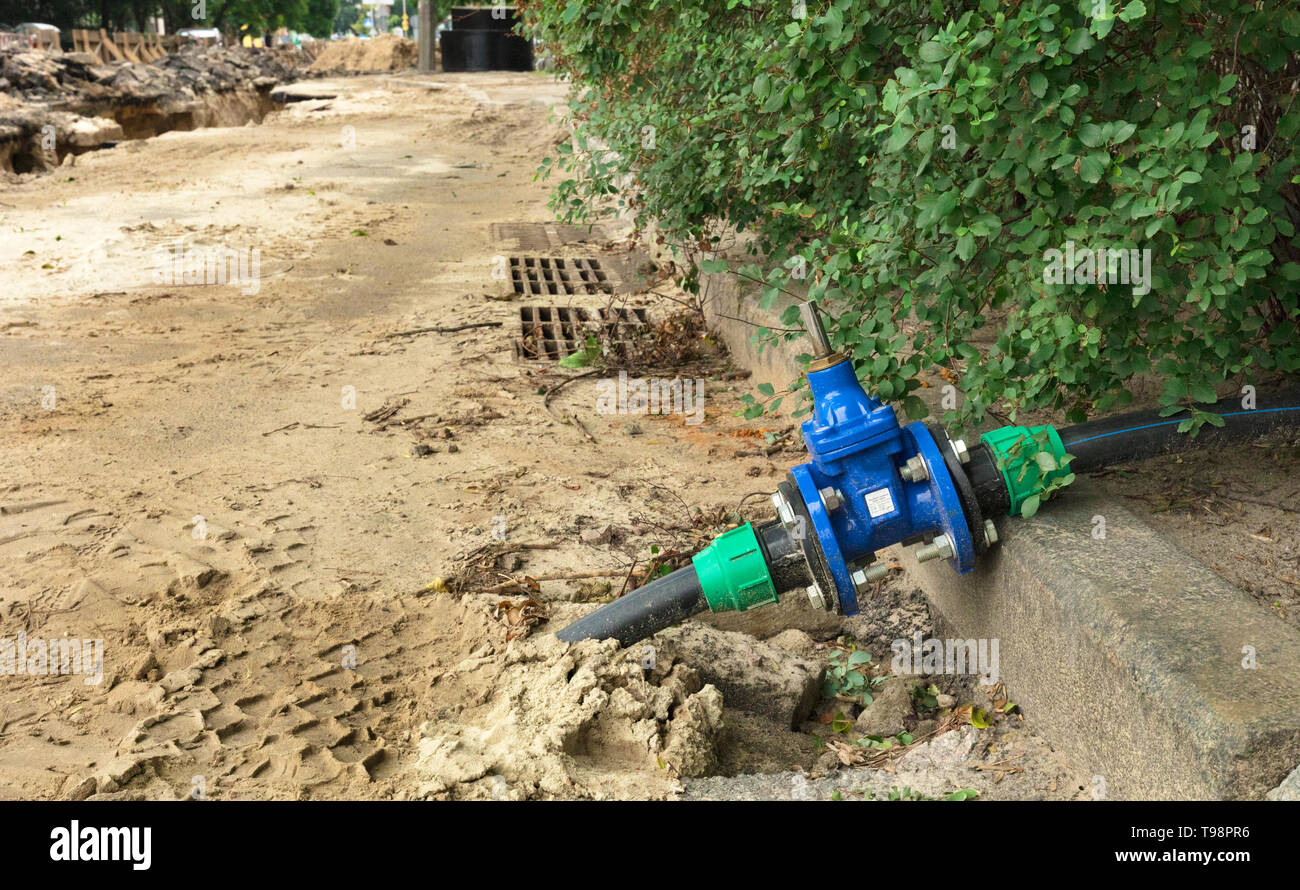 Water resistant water gate valves near the grilles of city stormworks ...