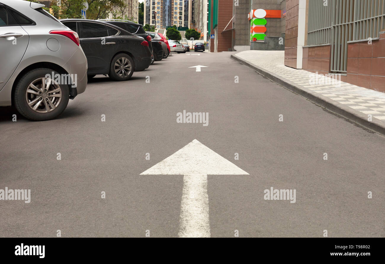 Road marking arrow hi-res stock photography and images - Alamy