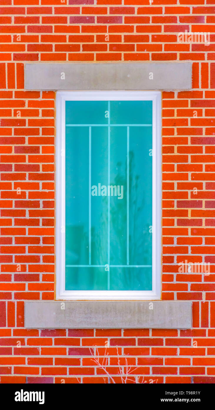 Clear Vertical Close up of the rectangular window of a building with ...