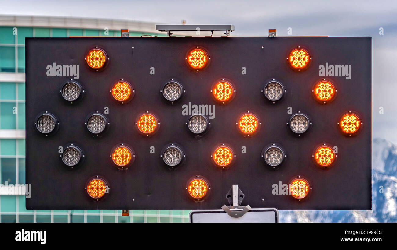 Clear Panorama Close up of an arrow board and Keep Right sign against a ...