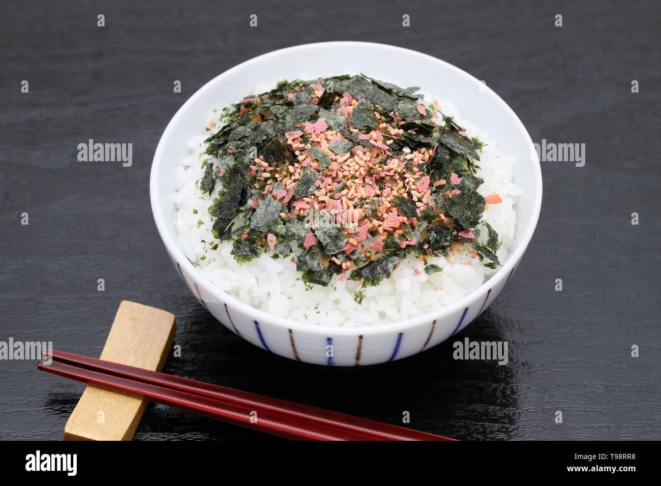 Japanese food, cooked rice with furikake of shake and nori Stock Photo ...