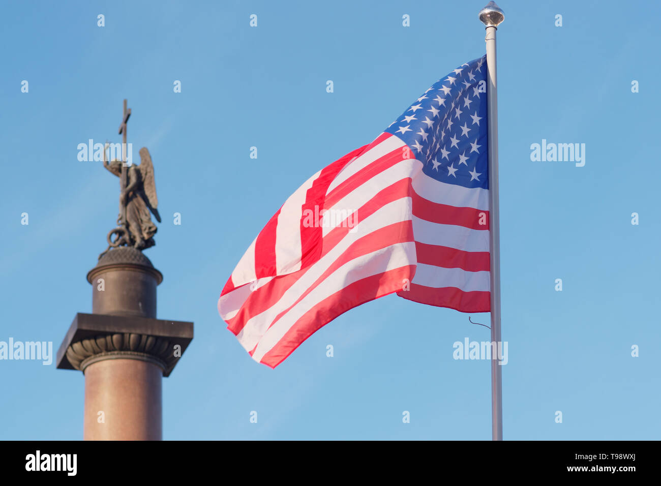 American flag against Alexander column in Saint Petersburg, Russia ...