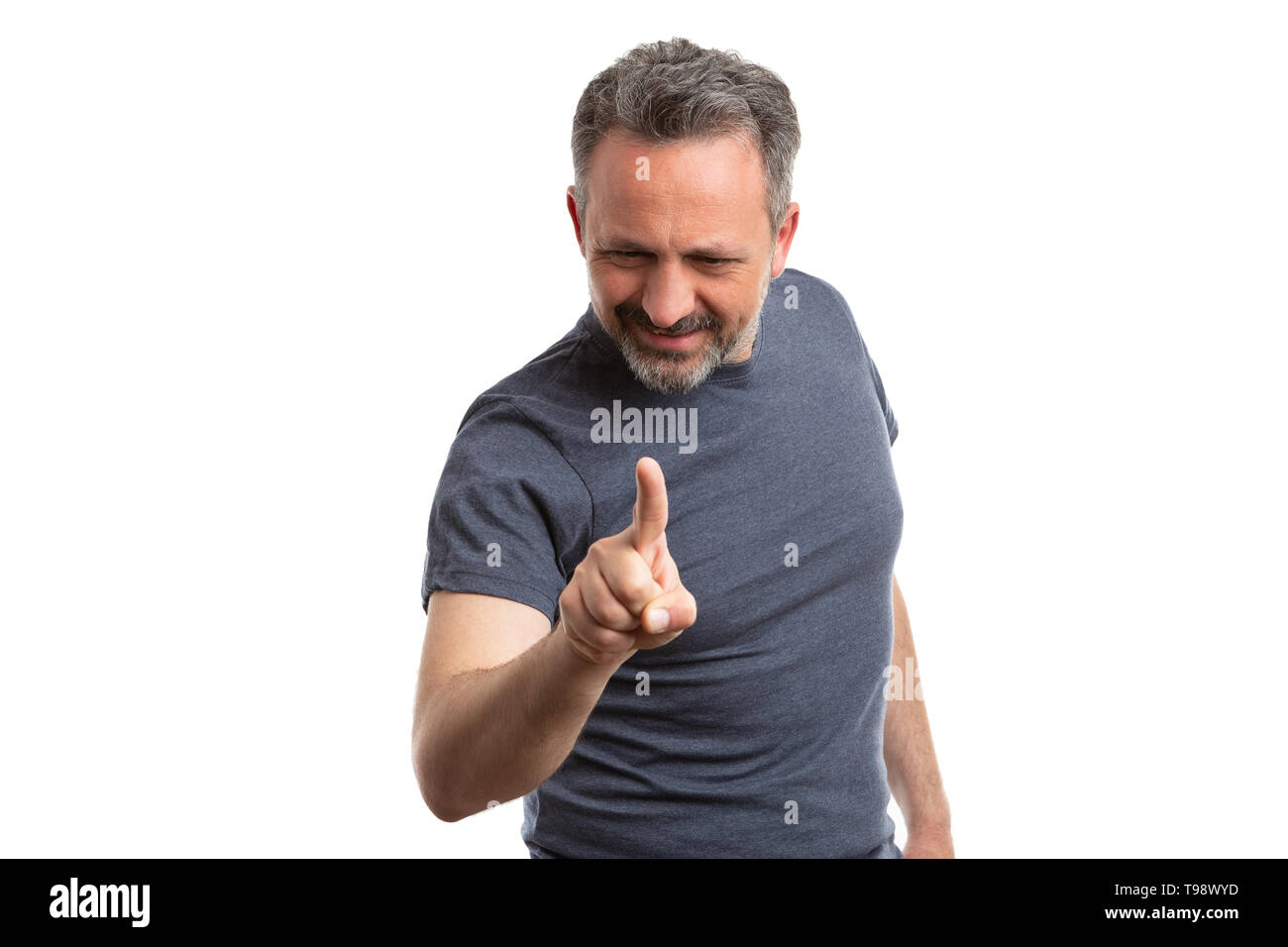 Man pressing button on invisible screen with focused expression closeup ...