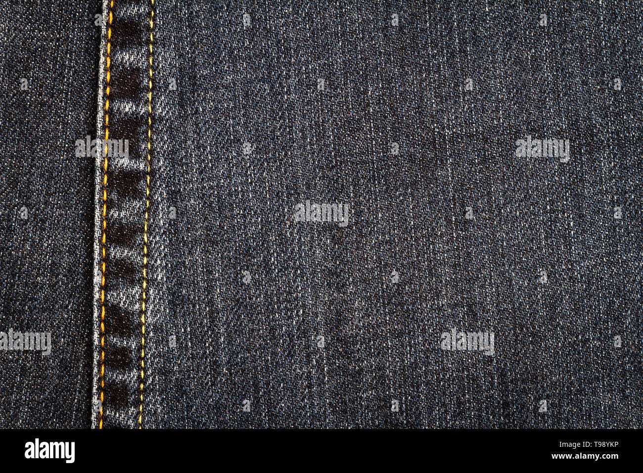 Black jeans texture. Denim jeans fabric background with a seam Stock ...