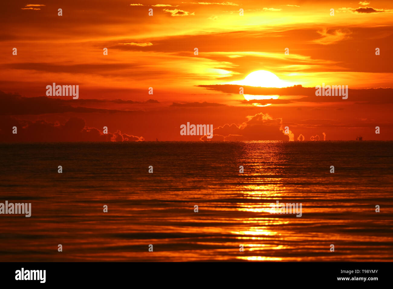 sun dawn back on morning sky silhouette colorful cloud Stock Photo - Alamy