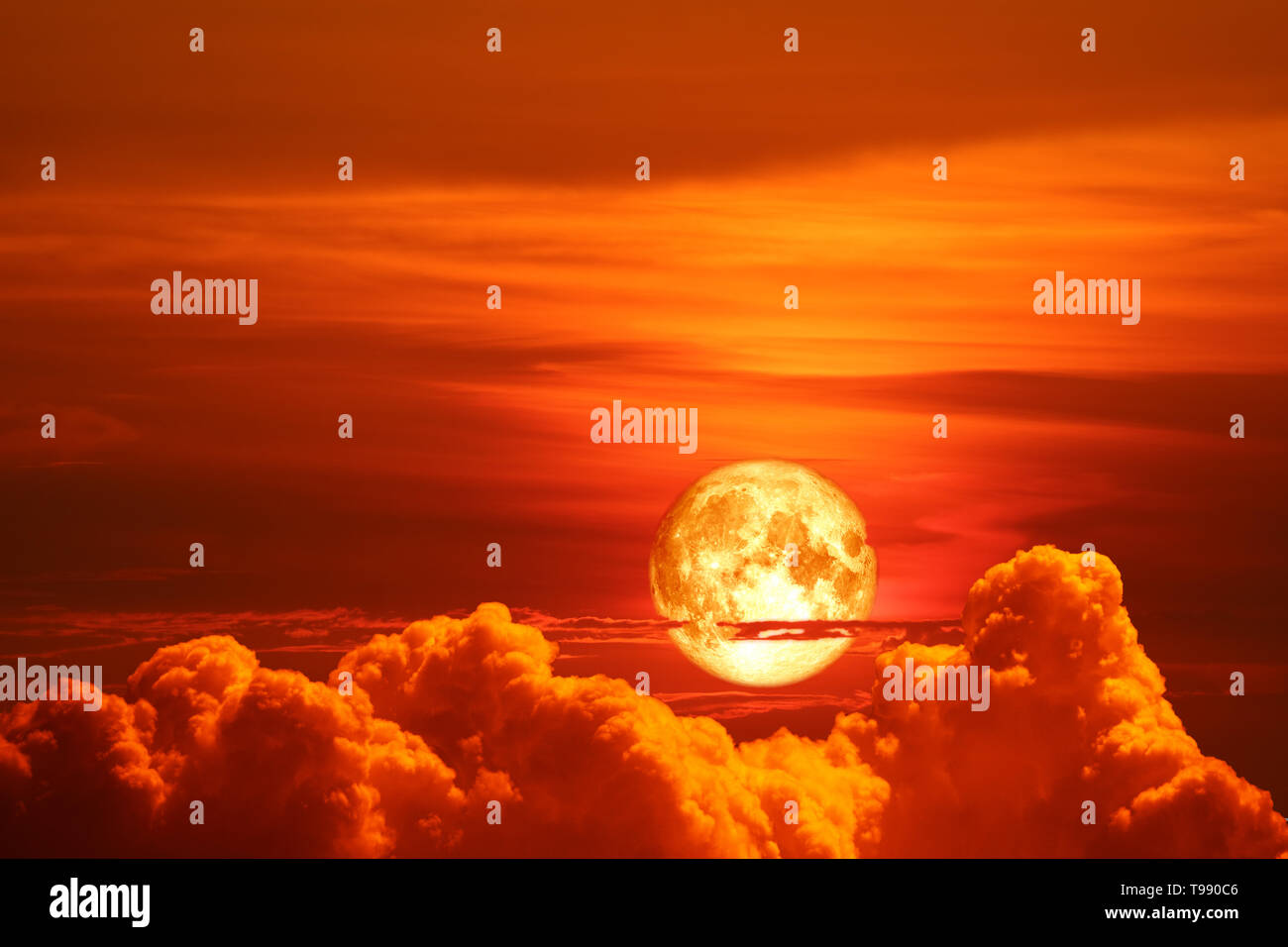 old moon back on silhouette colorful heap cloud on night red sky ...