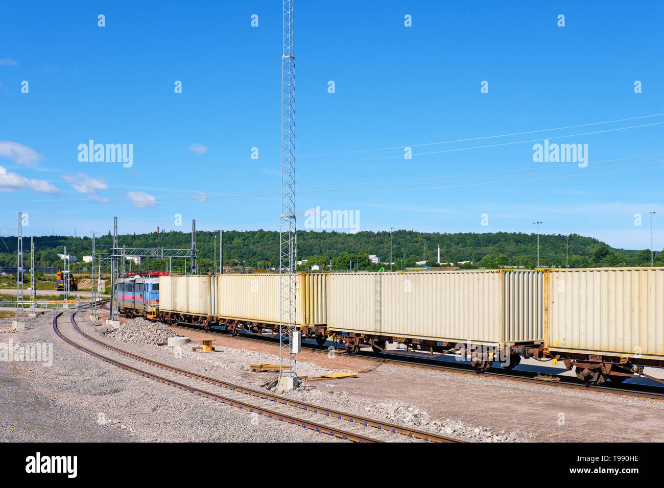 Train with containers on wagons Stock Photo - Alamy