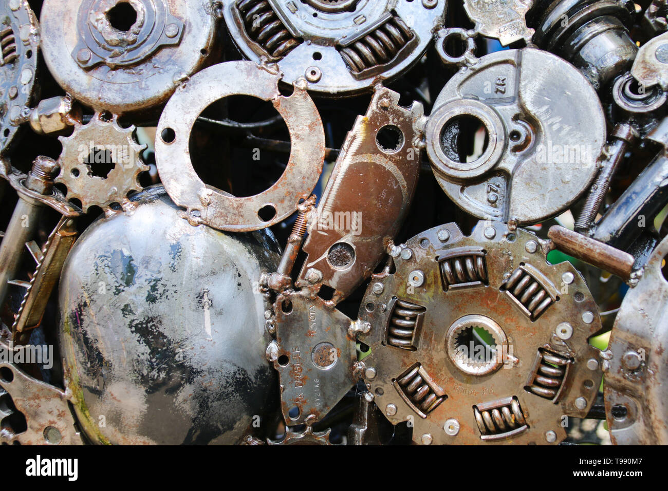 An industrial abstract textured background of recycled scrap metal car ...