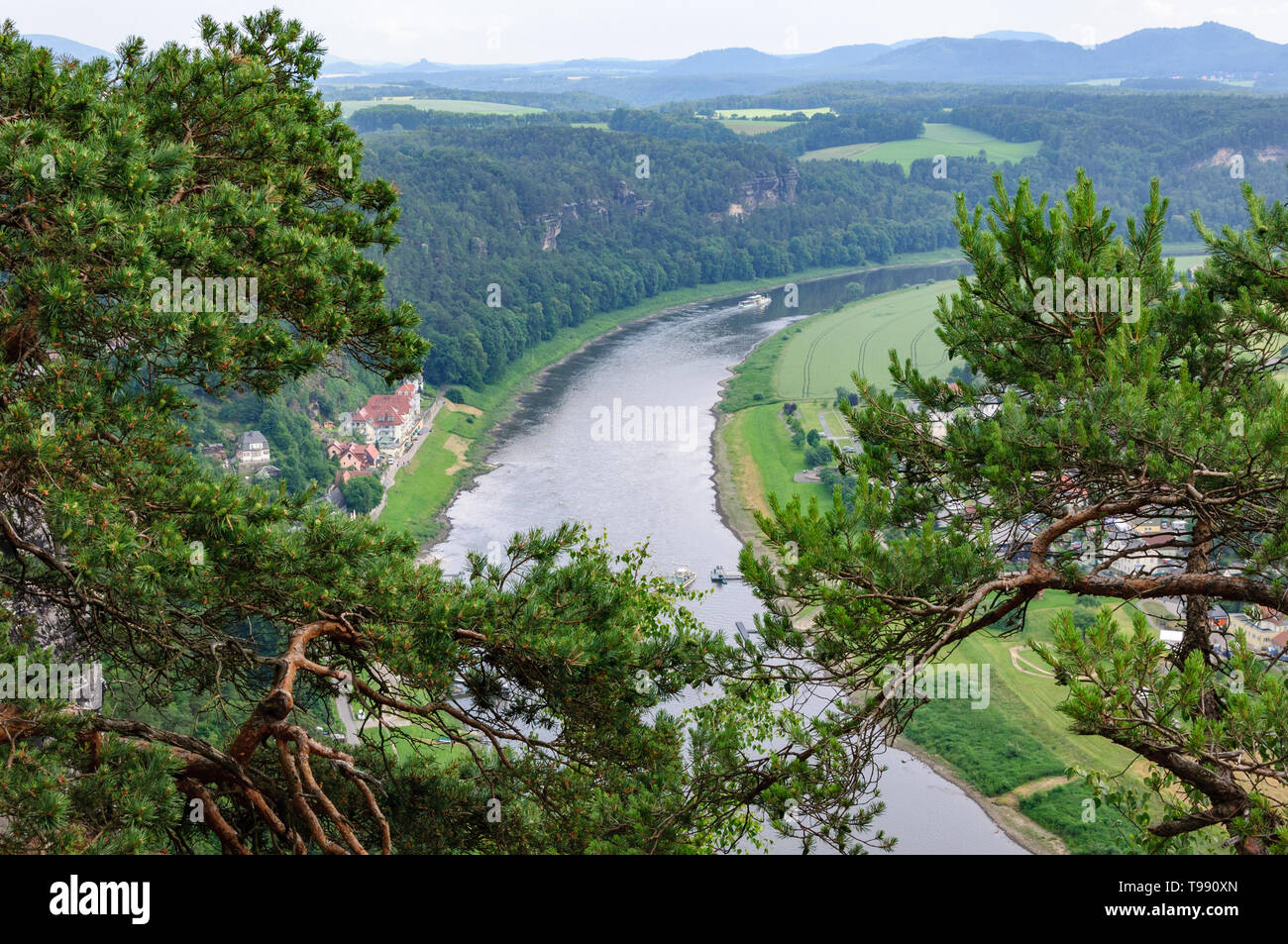 Aerial view of the navigable river among the green forests.Picturesque ...