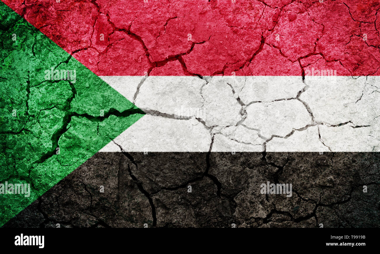Republic of the Sudan flag on dry earth ground texture background Stock ...
