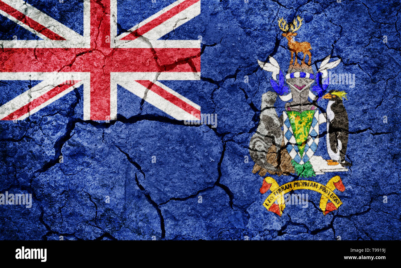 South Georgia and the South Sandwich Islands flag on dry earth ground ...