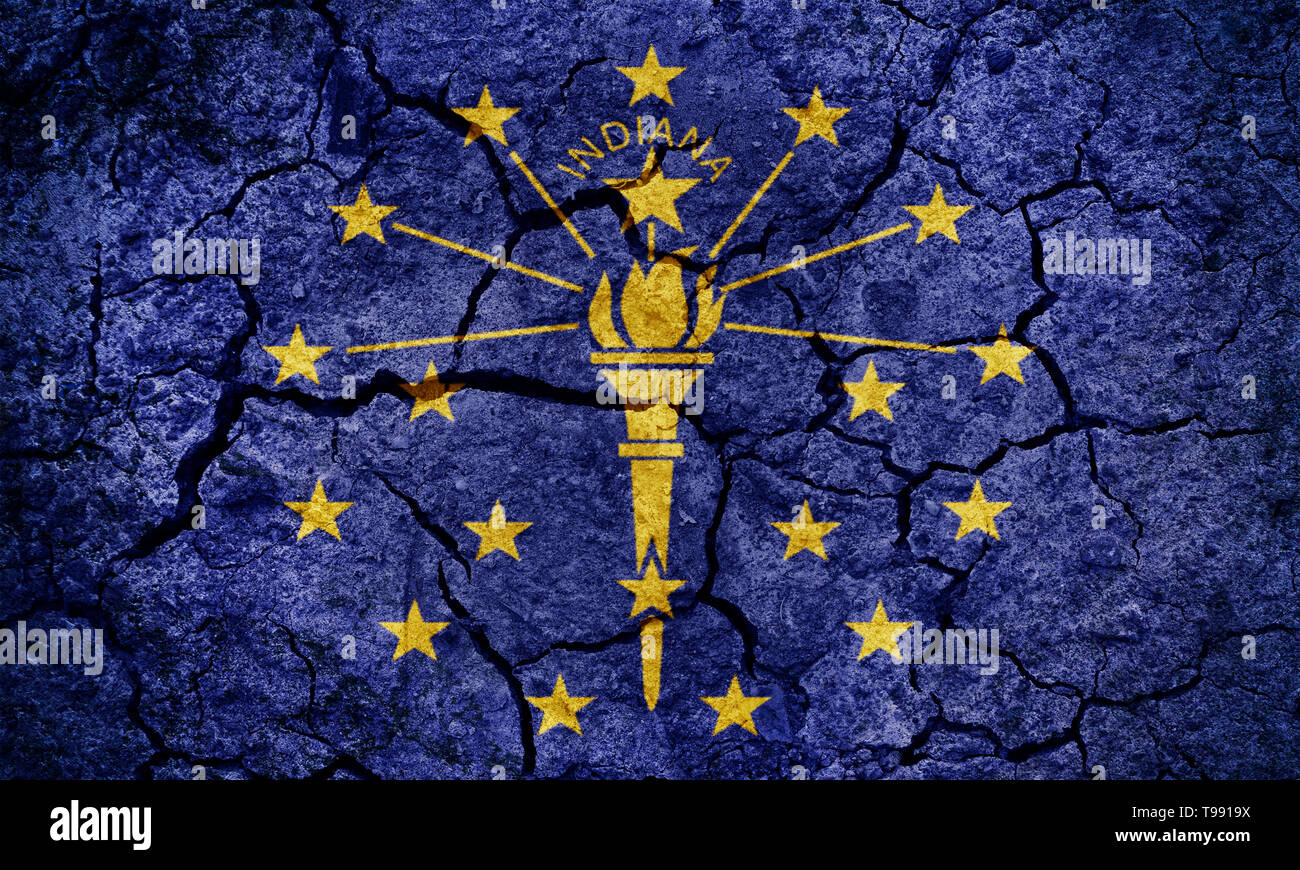 Flag of Indiana, U.S. state, on dry earth ground texture background ...