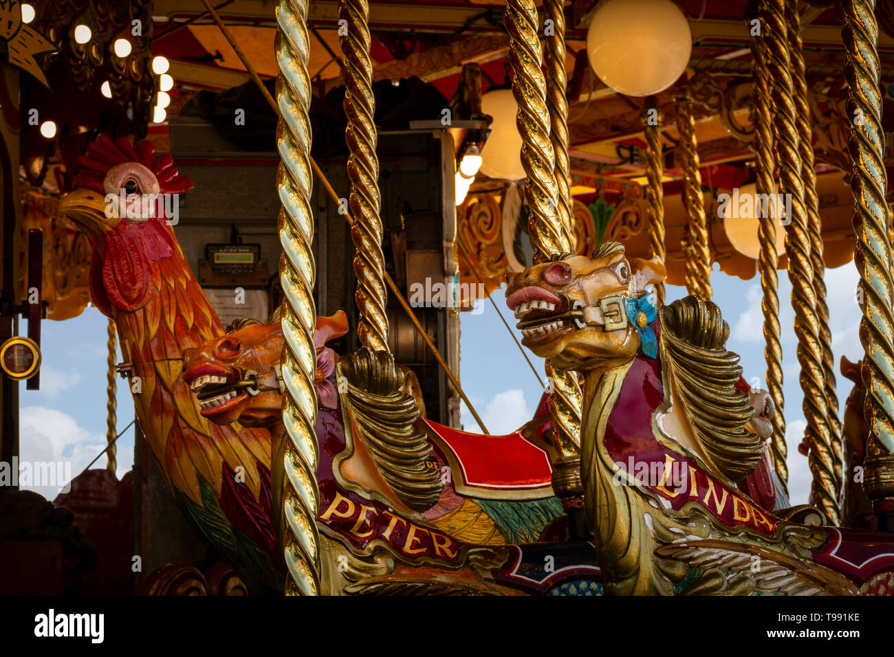 Steam powered carousel in action Stock Photo - Alamy