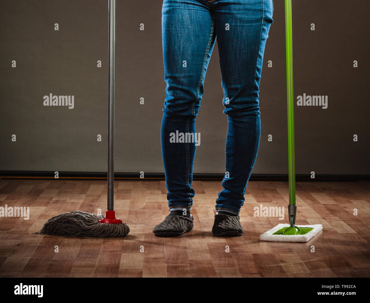 Cleanup housework concept. Cleaning woman legs, girl mopping floor ...