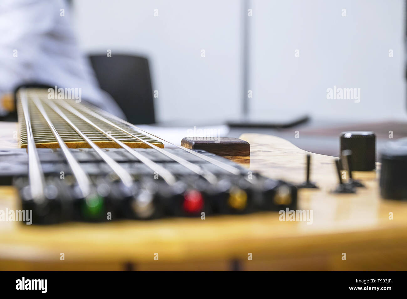 Modern Electric six-string bass guitar Stock Photo - Alamy
