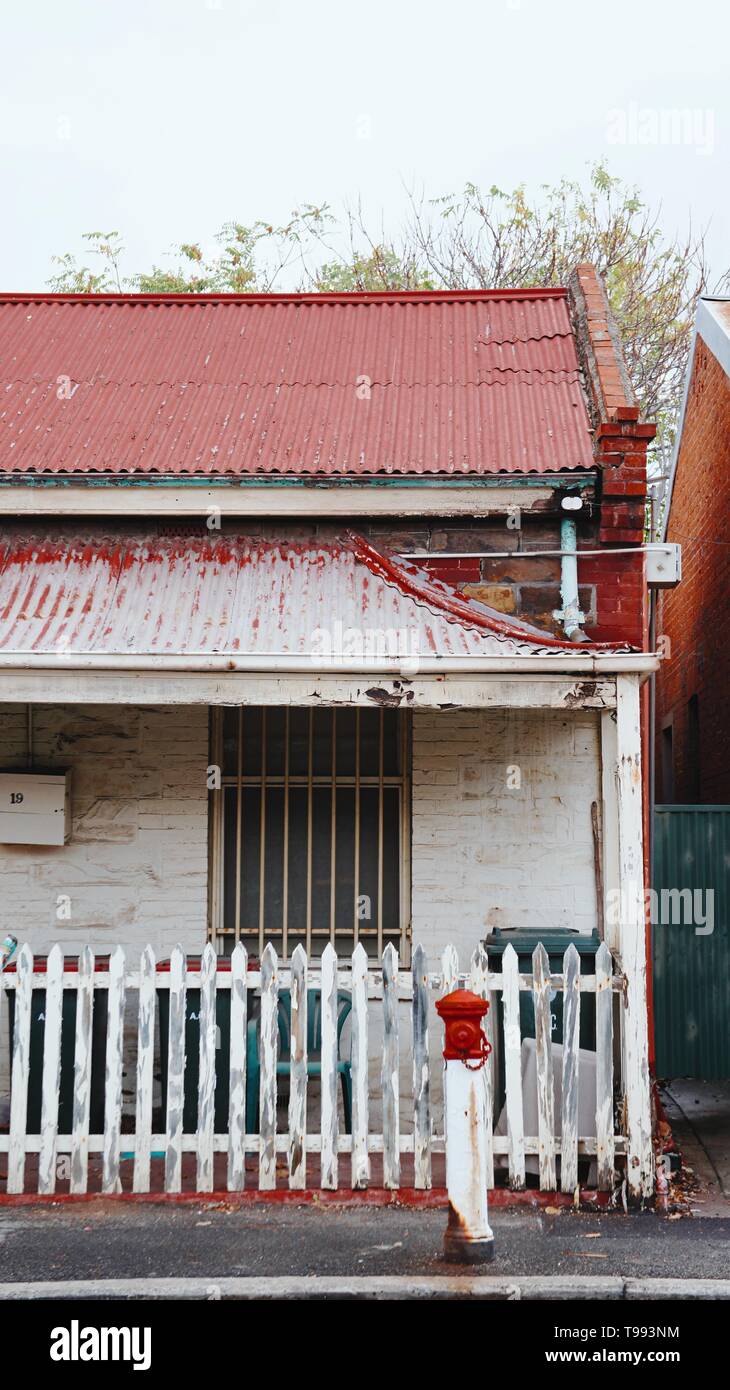 Red house on a street Stock Photo - Alamy