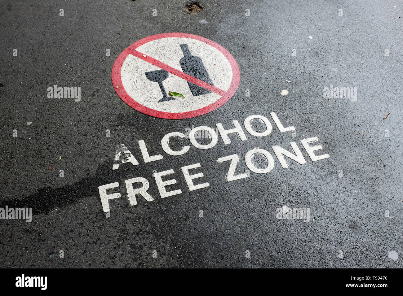 "Alcohol free zone" painted on a pavement in Nelson, New Zealand Stock ...