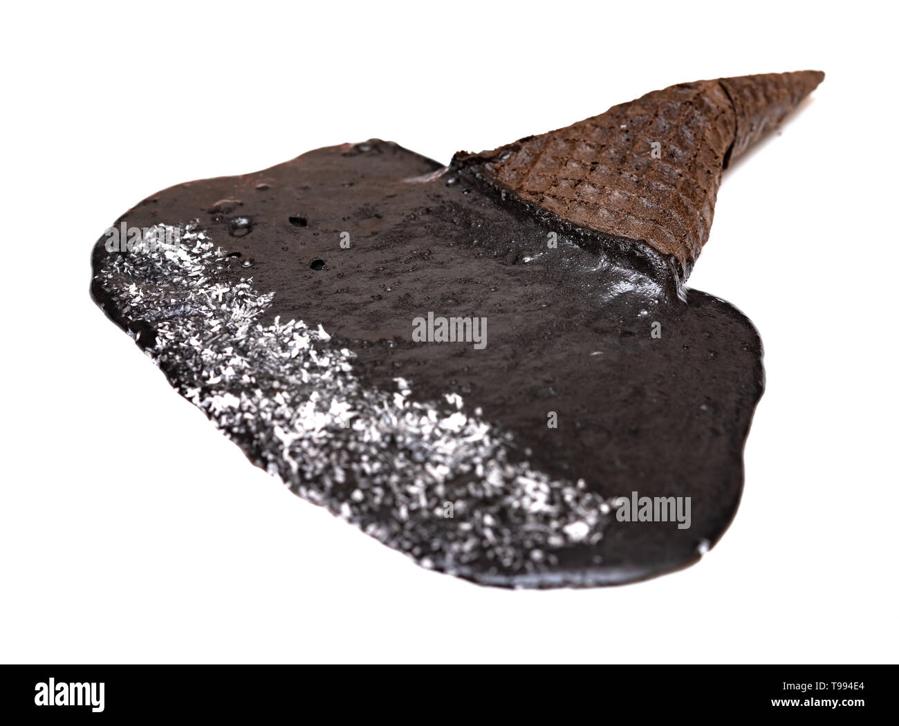 side view chocolate flavor ice cream cone with shredded coconut melted ...