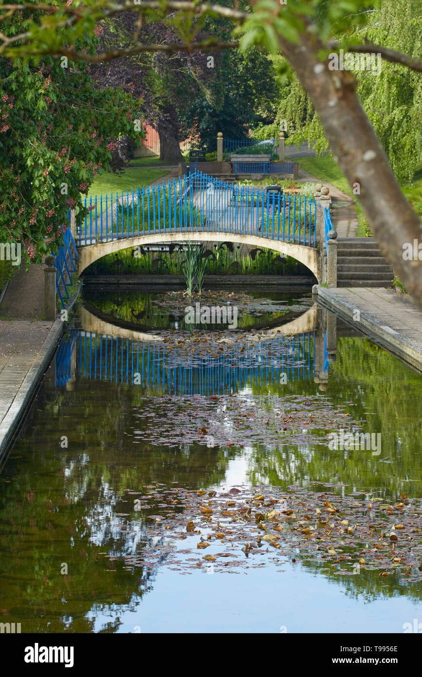 Blue bridge over Abbey Park lake in Evesham, England, United Kingdom ...