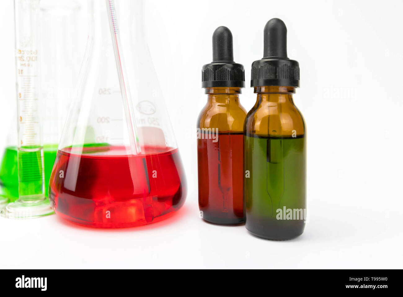 Bottom and beaker isolated on white. Several chemical solution in flask ...