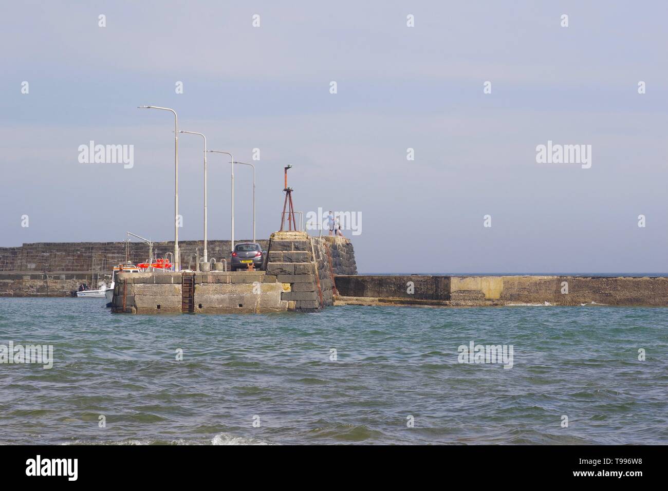 Anglers Sea fishing from the Harbour Wall at St Monans, Fife, Scotland ...