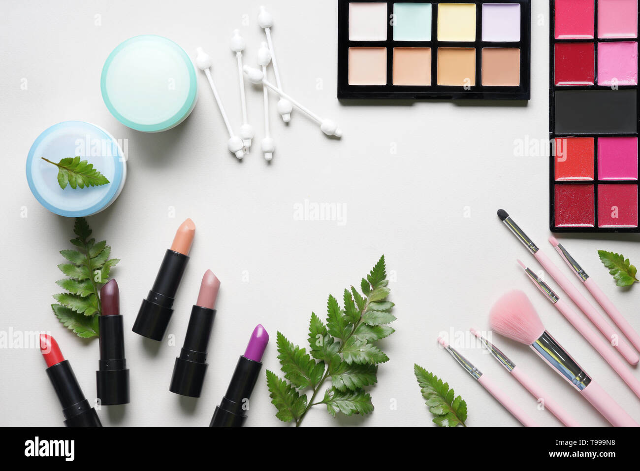 Composition with cosmetics on white background Stock Photo - Alamy