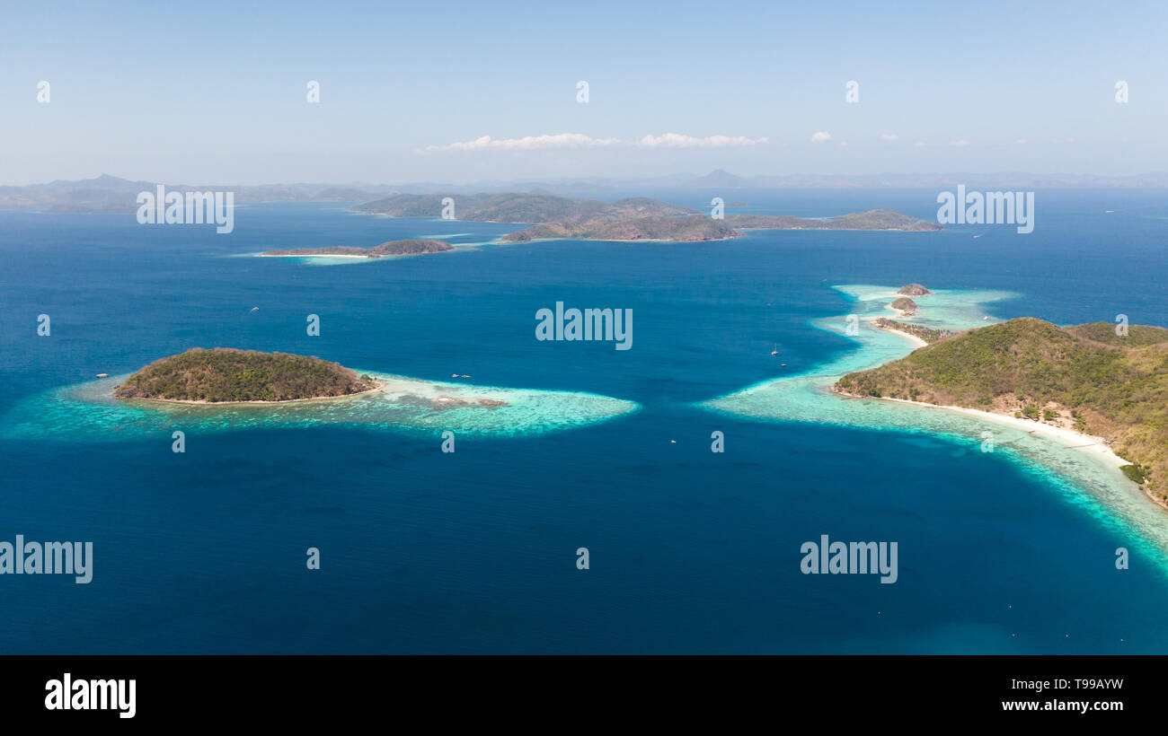 aerial seascape Lagoons with blue, azure water in middle of small ...