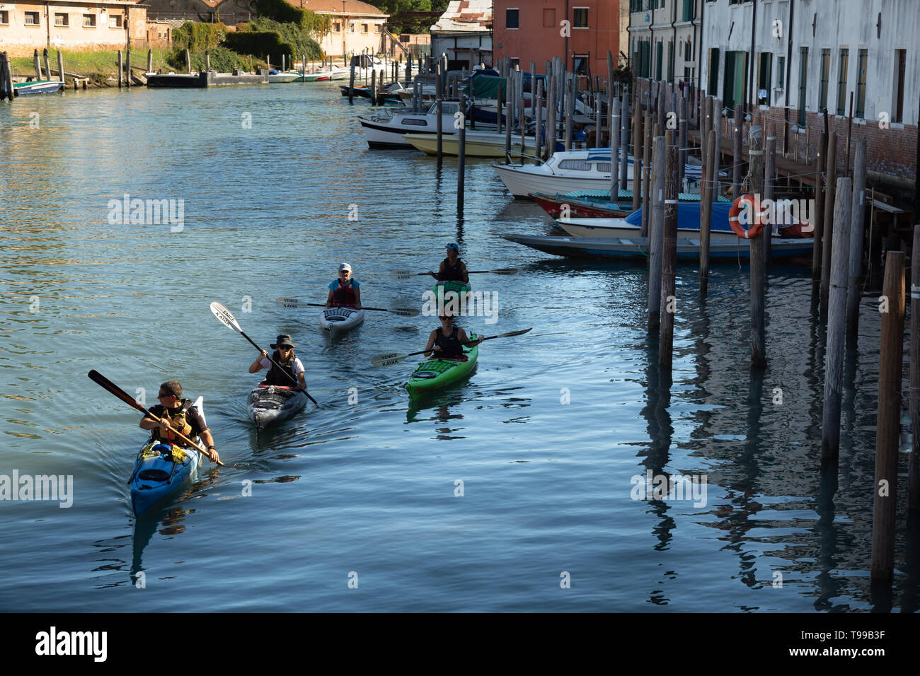 People kayaking in the Venetian canal. Venice, Italy Stock Photo - Alamy